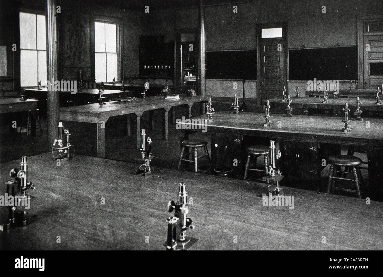 Early 1900s laboratory with microscopes hi-res stock photography and ...