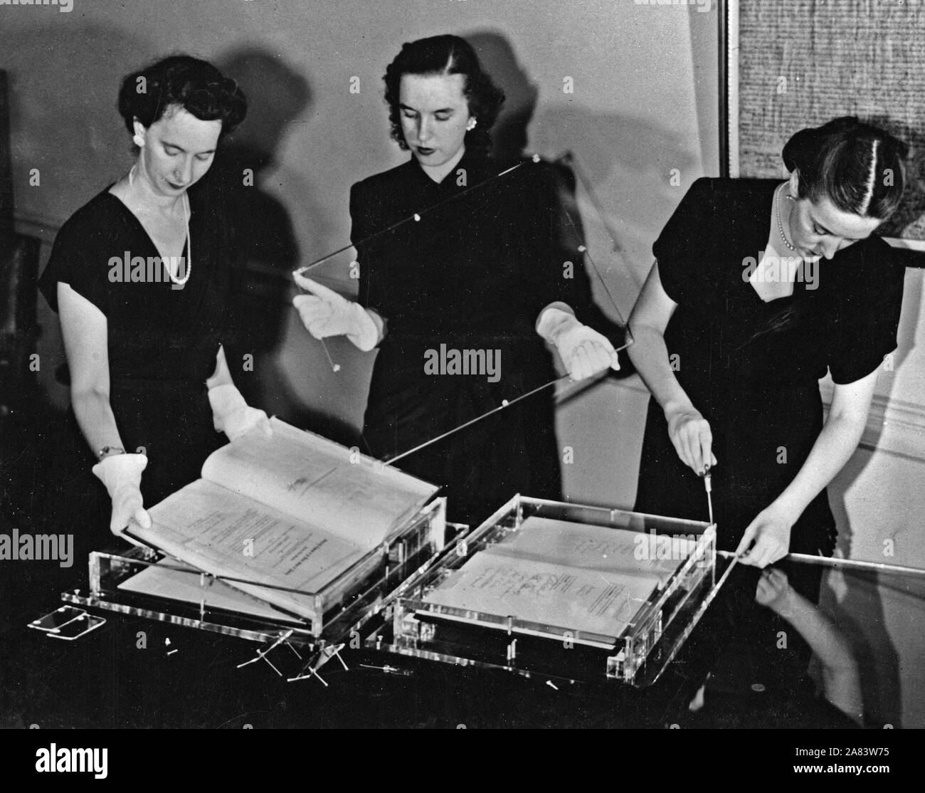 Photograph of National Archives Personnel Working on Installation of ...