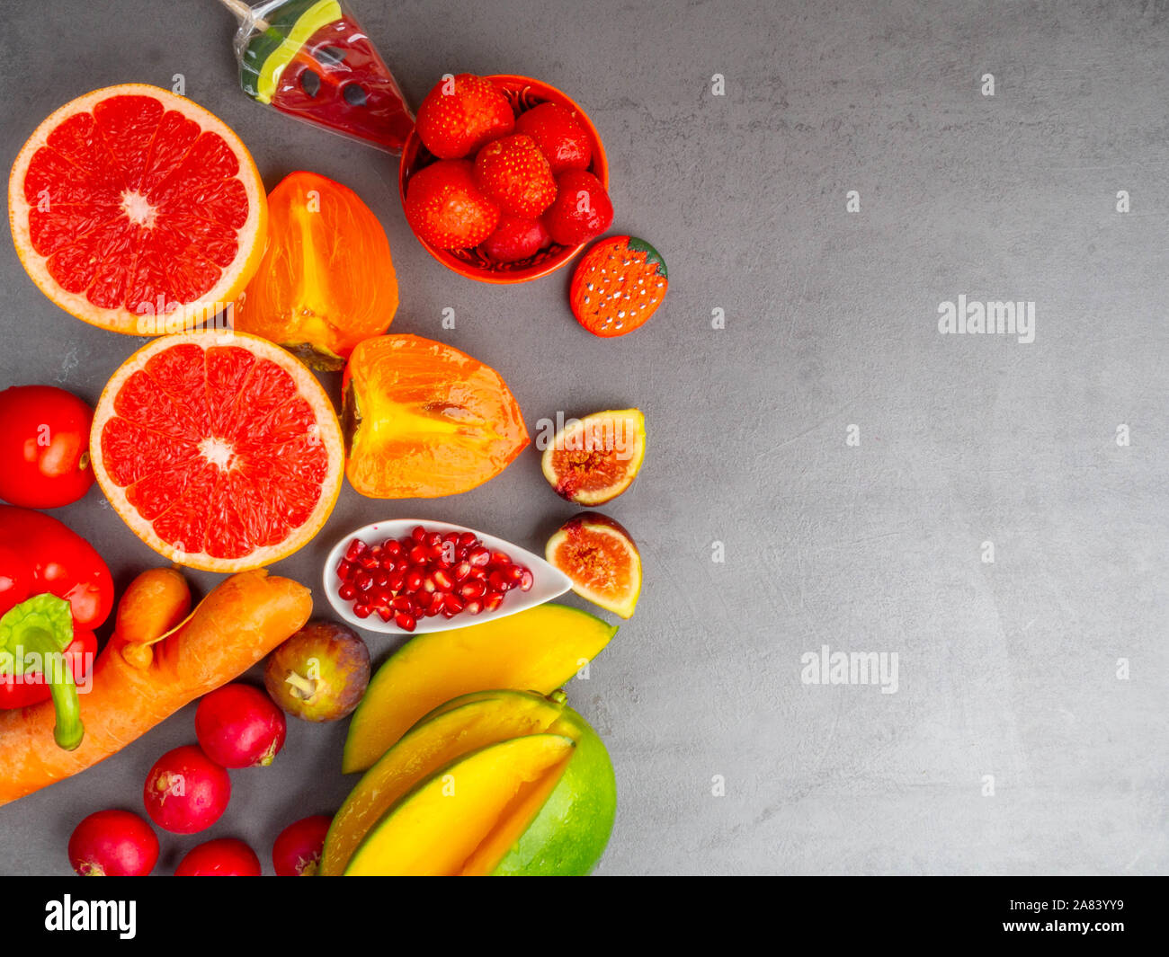 fresh red, orange, yellow fruit and vegetables rich in antioxidants ...