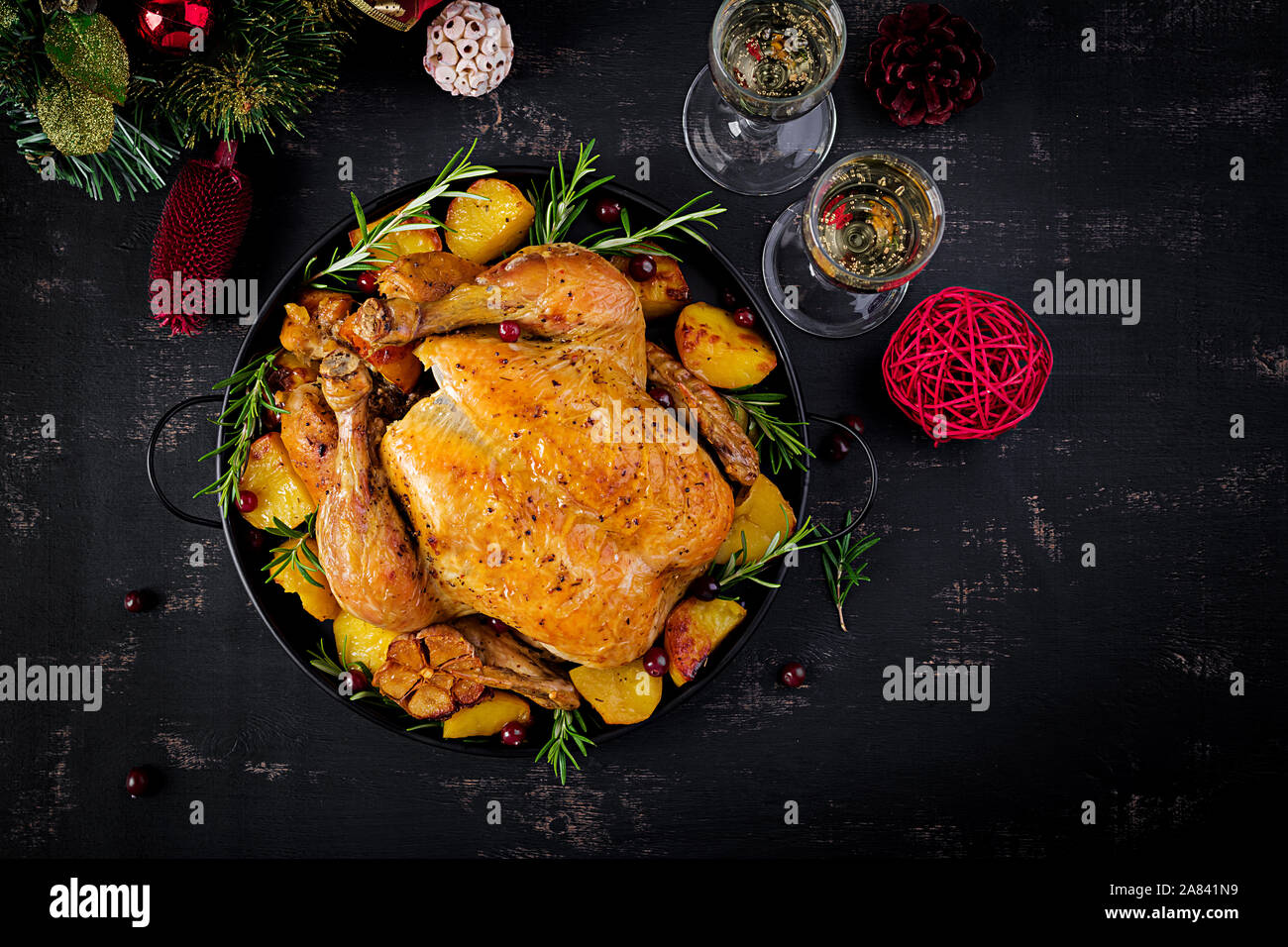 Baked turkey or chicken. The Christmas table is served with a turkey ...