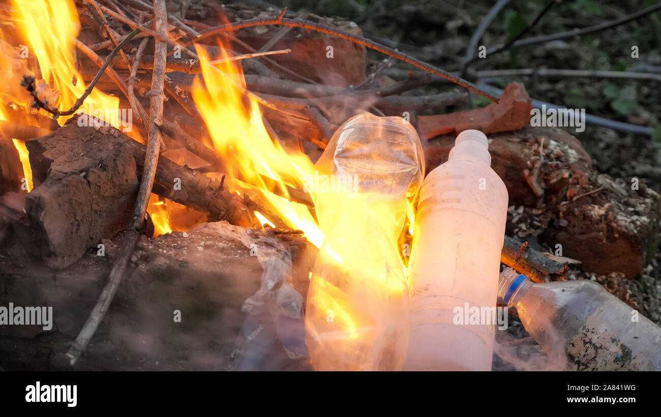 flame fire and smoke burning garbage waste of plastic to air pollution ...