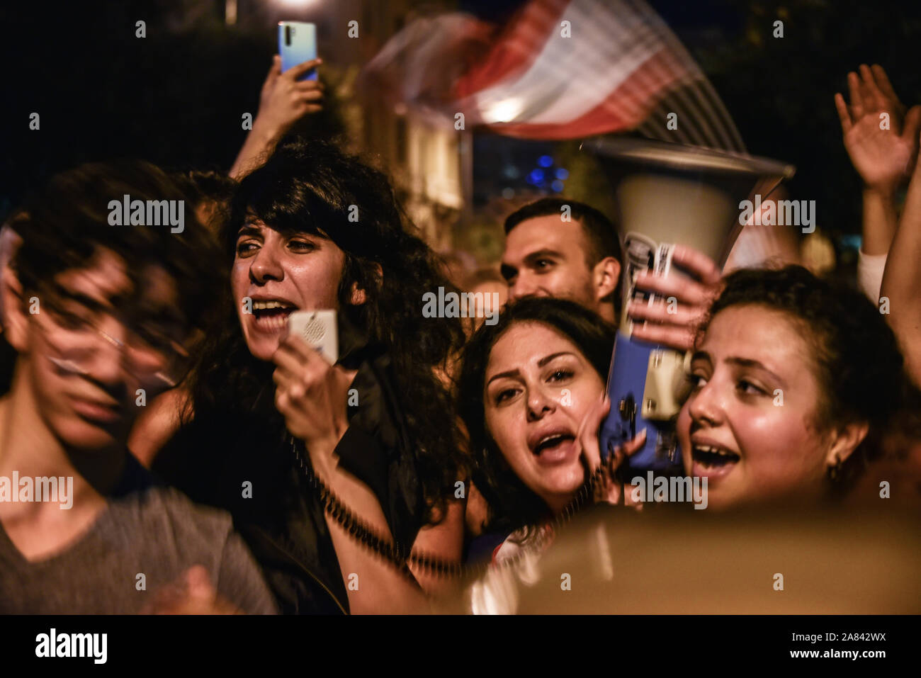 Woman shouting megaphone crowd hi-res stock photography and images - Alamy