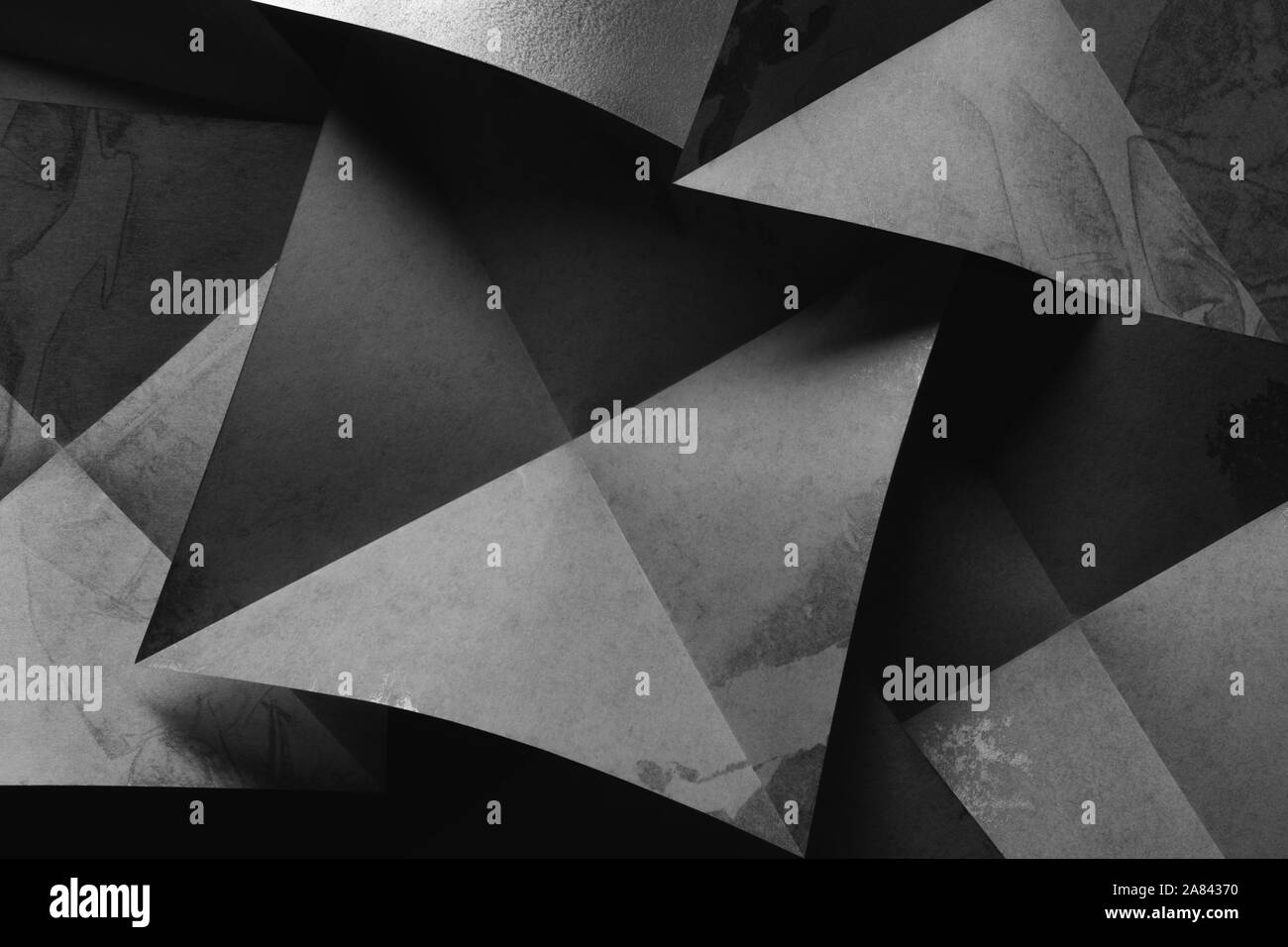 Geometric shapes of gray paper for dark background Stock Photo - Alamy