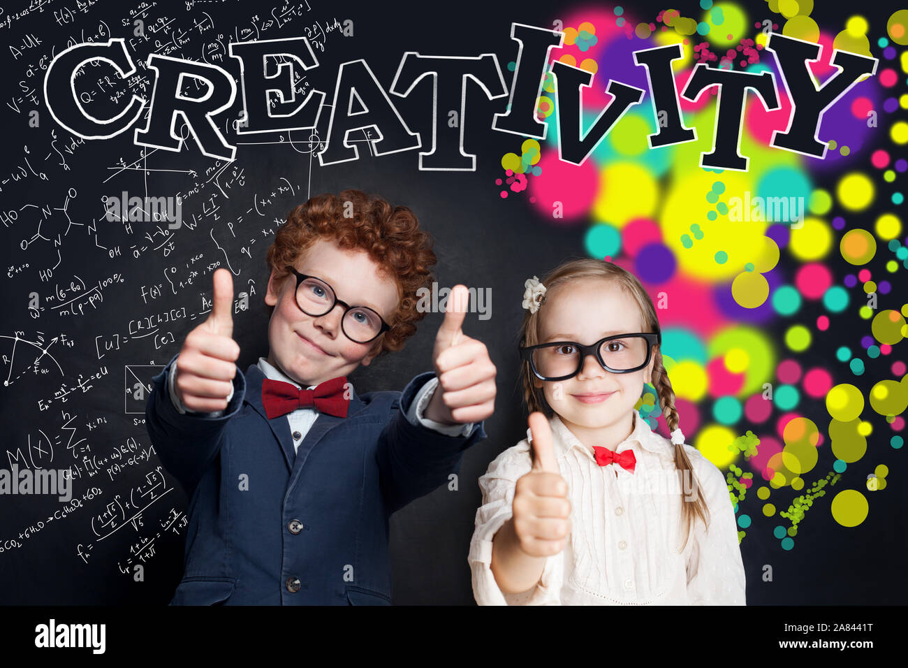 Creativity kids. Happy little boy and girl on blackboard background ...