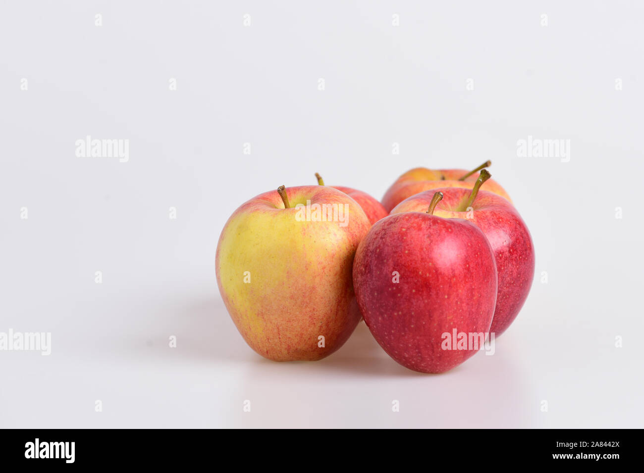 Apple fruits on light grey background. Apples in bright and juicy red ...