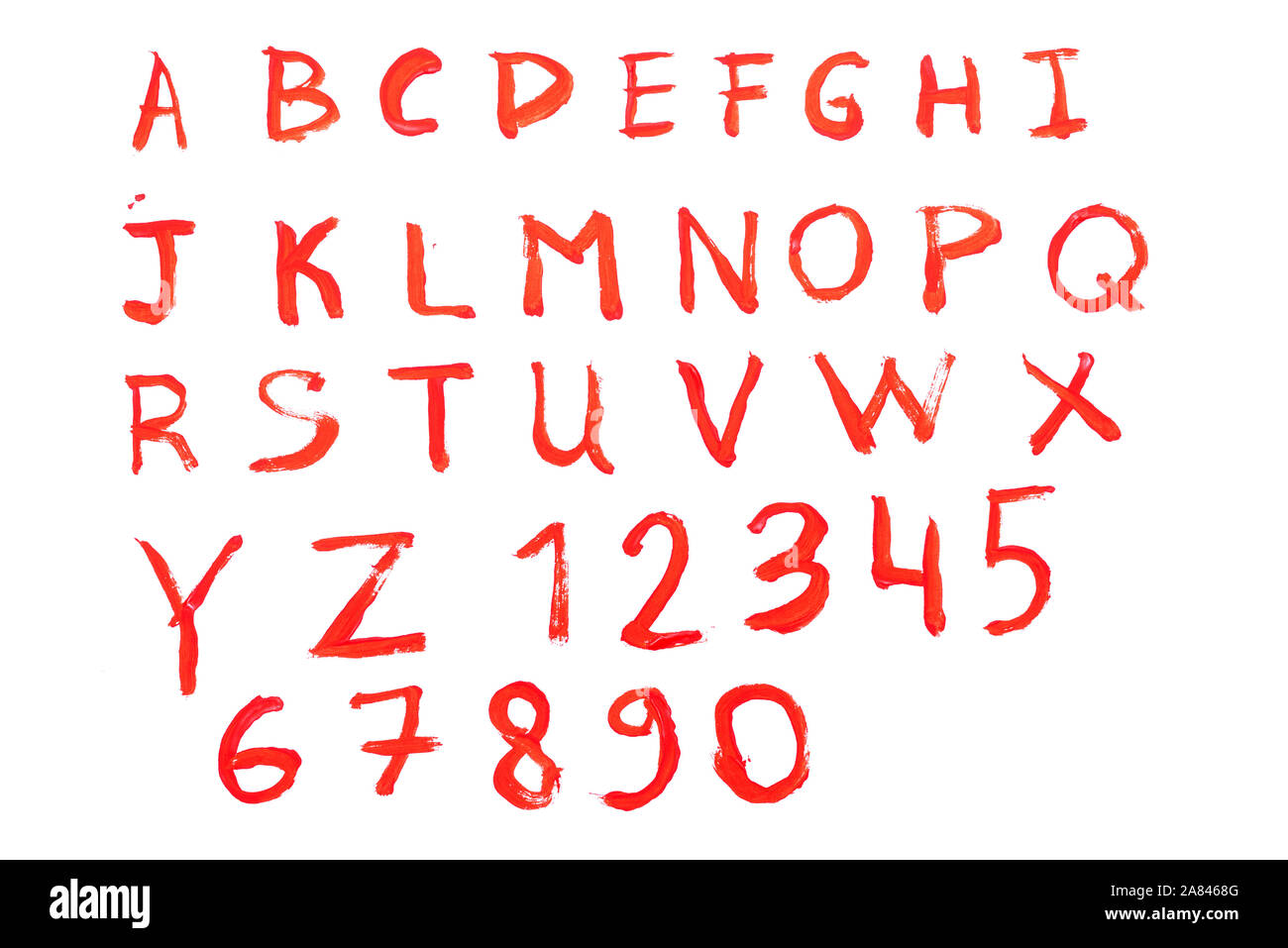 Red color alphabet characters made by gouache paint isolated on white ...
