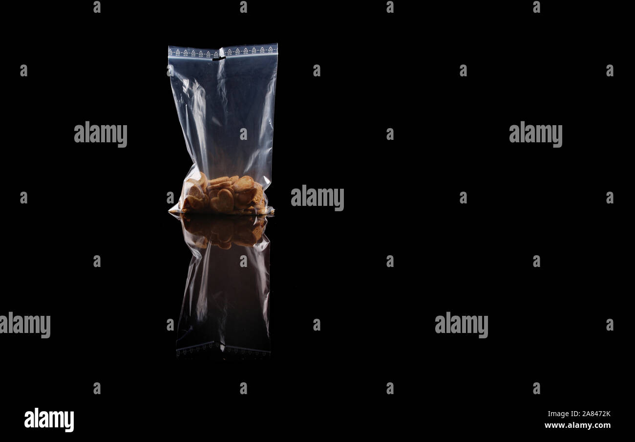 sweets in plastic food packaging with reflection and copy space Stock ...