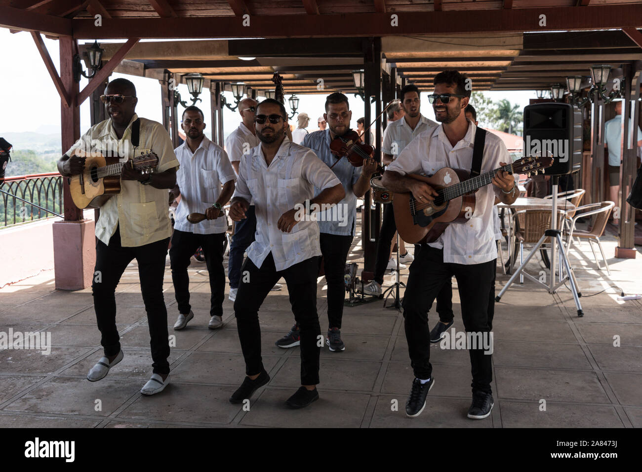A local Cuban band performing for visiting tourists at the outlook ...