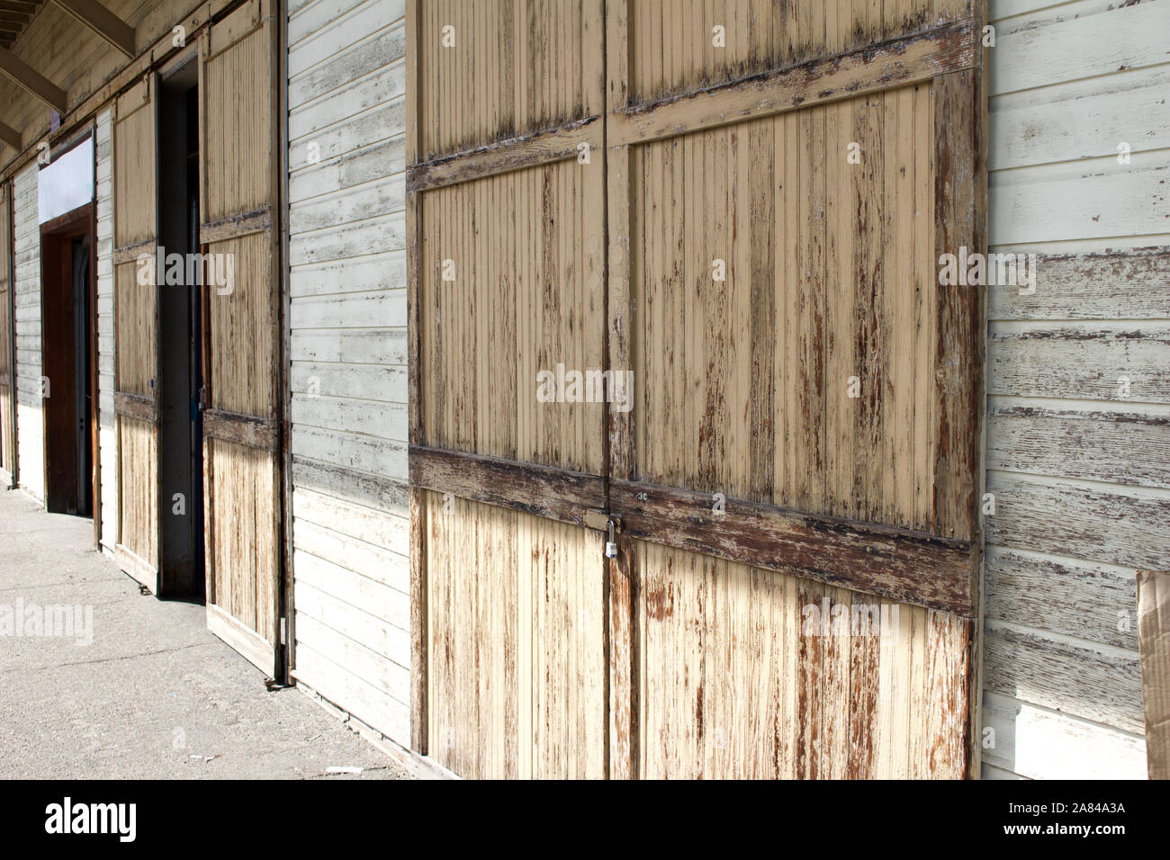 Rugged vintage train station loading dock with old rustic brown wooden ...