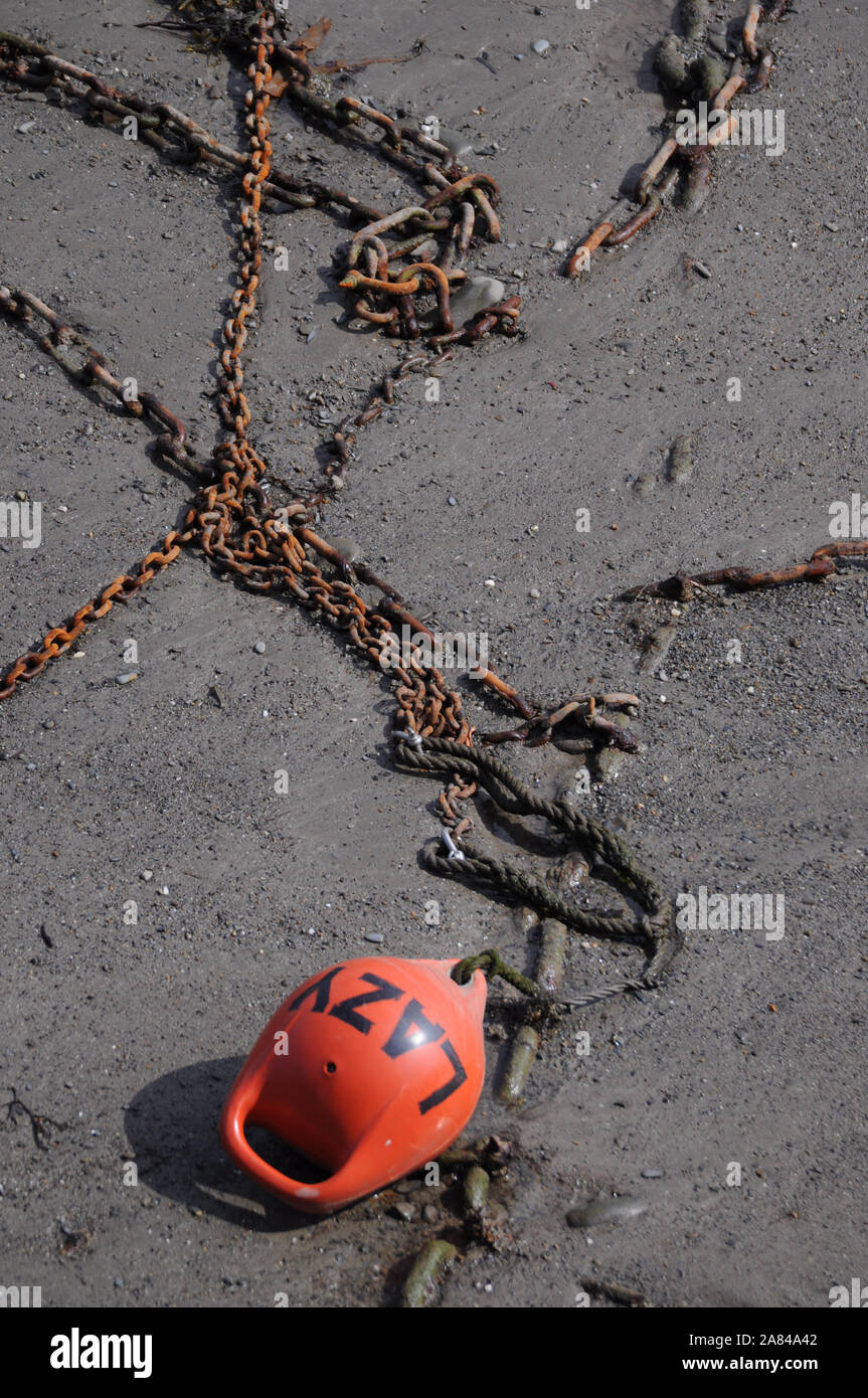 a boat buoy with the name "Lazy", perhaps a simile for "Lazy Boy Stock ...