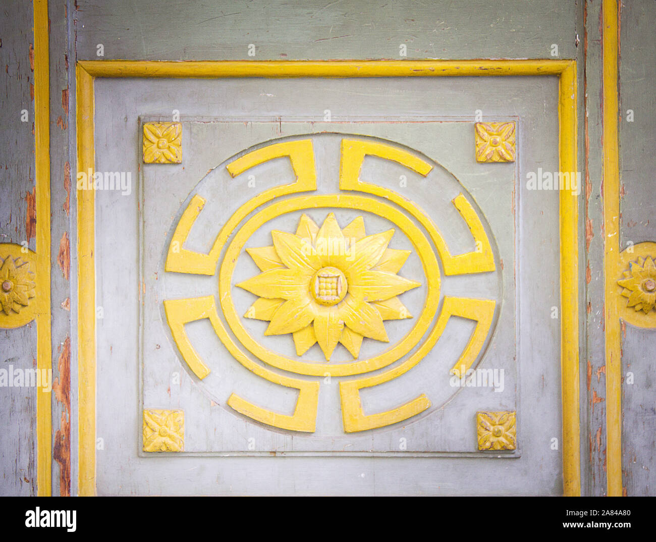 Solar sign on the building, in the center of the solar flower ...