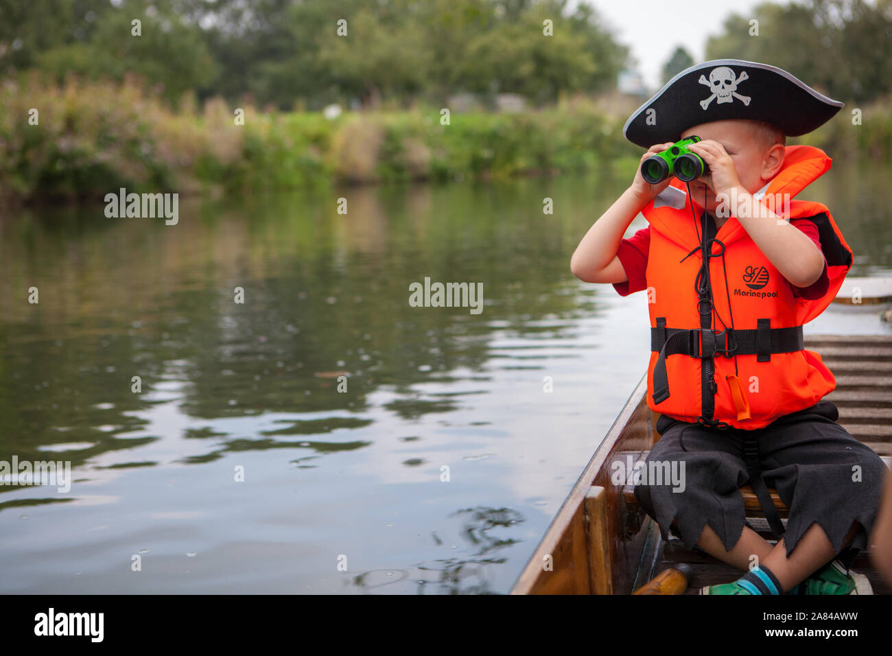 Children rowing a boat hi-res stock photography and images - Alamy