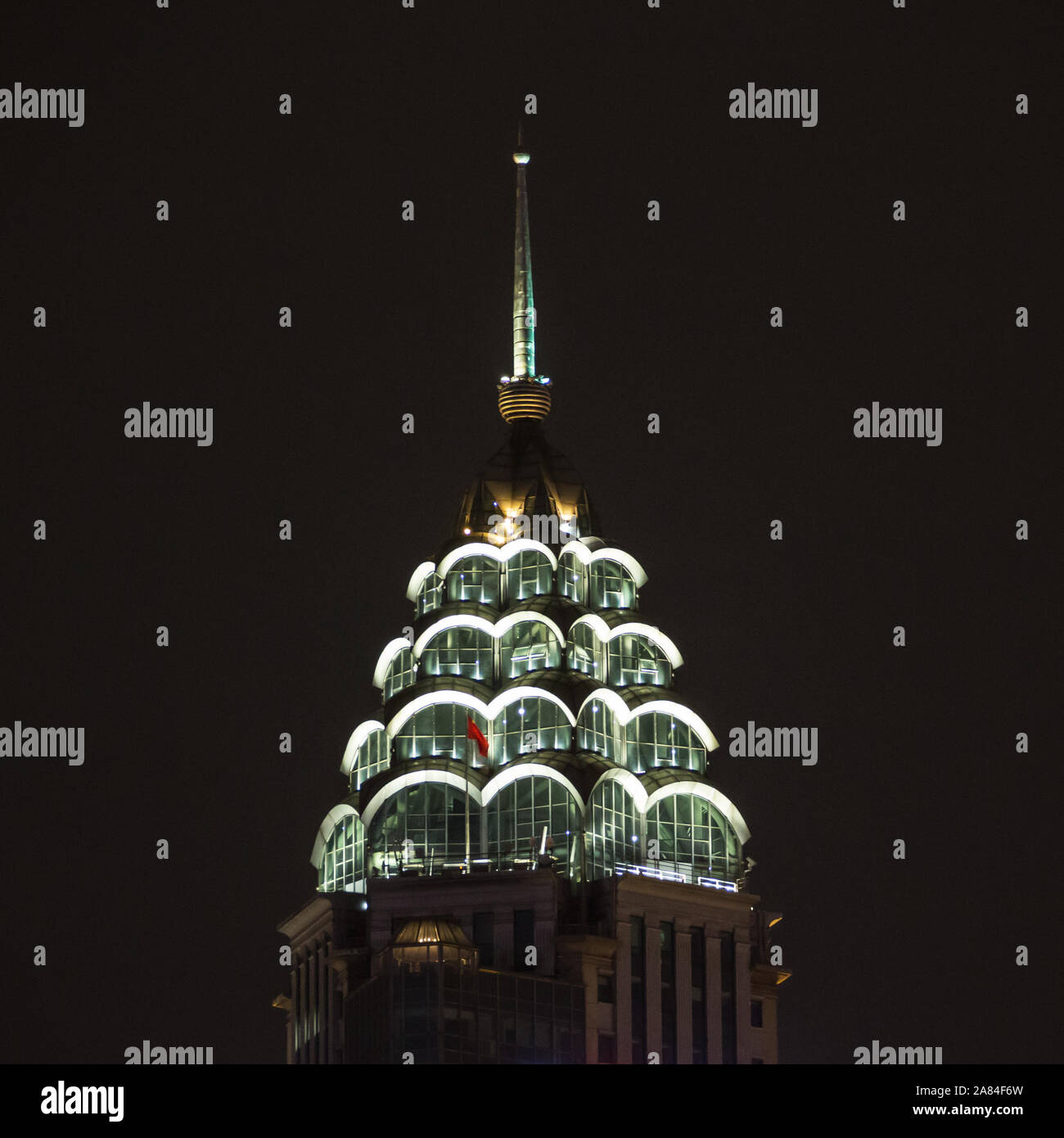 View of the top of the Guangming Building at night in Shanghai Stock ...