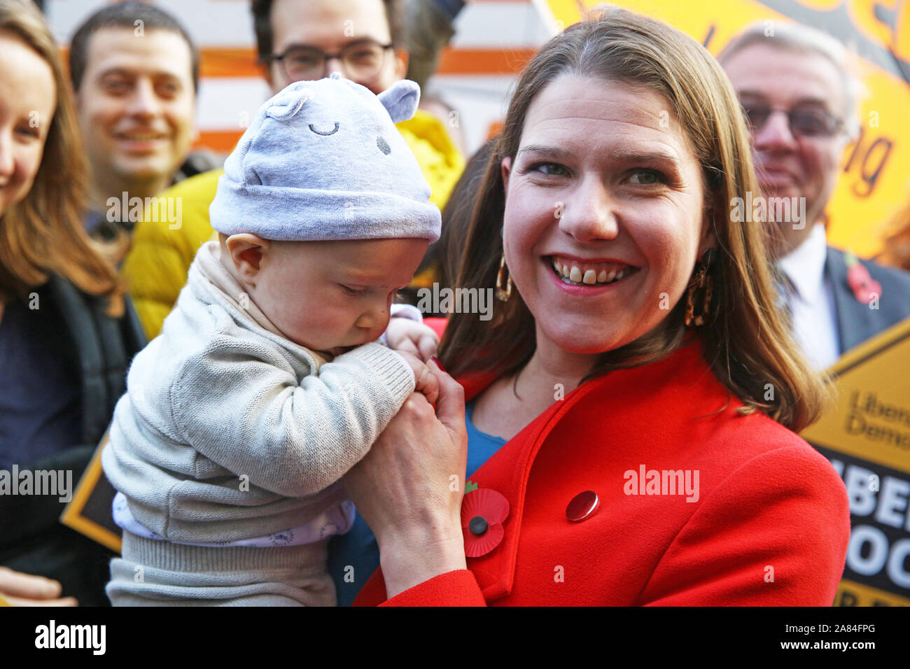 Liberal Democrat leader Jo Swinson holding baby Sam Skinner, aged three ...