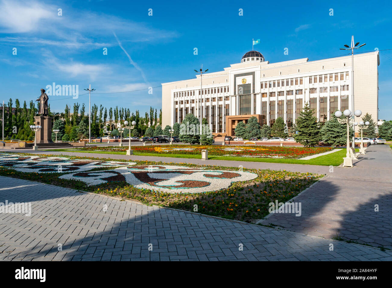 Taraz Regional Akimat City Hall with Waving Kazakh Flag and Statue of ...