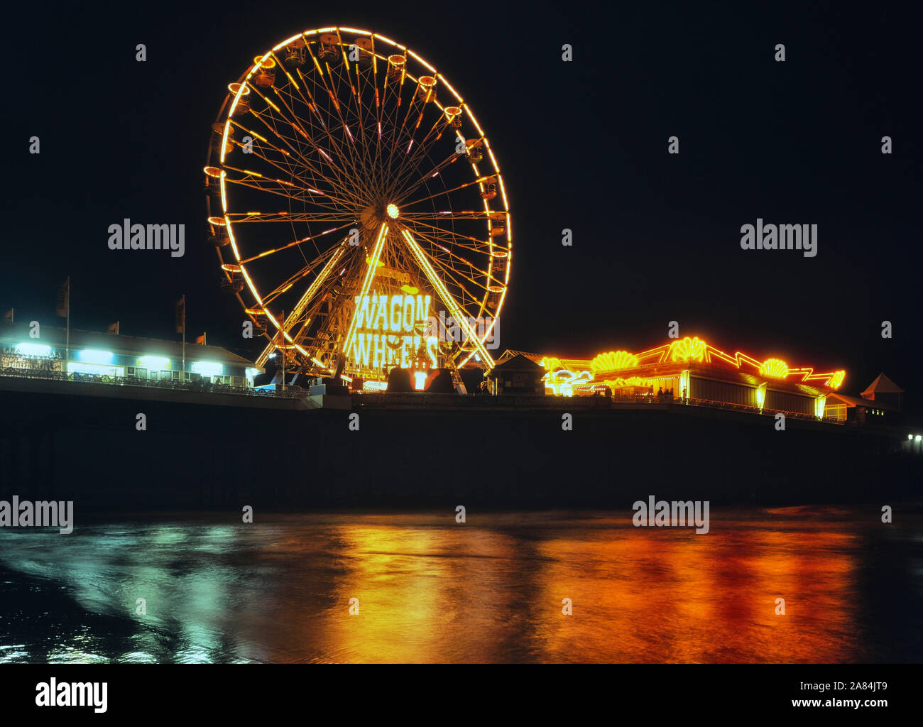 'Wagon wheel' fairground big wheel at twilight on Blackpool's Central ...