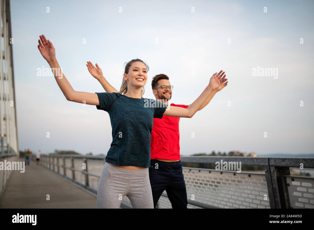 Young people running and exercising. Living healthy sporty lifestyle ...