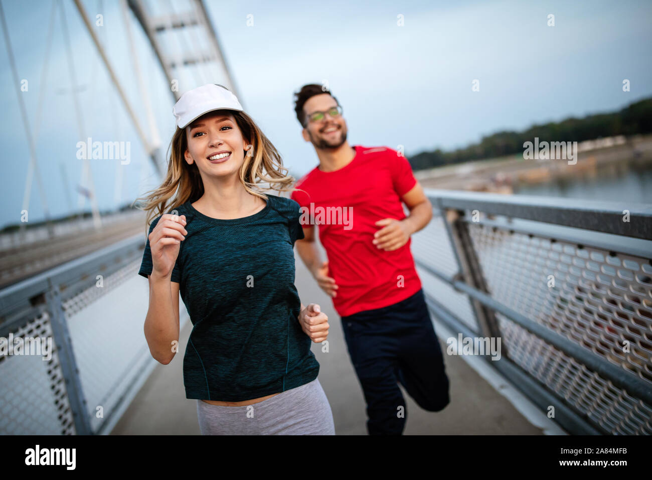 Young people running and exercising. Living healthy sporty lifestyle ...
