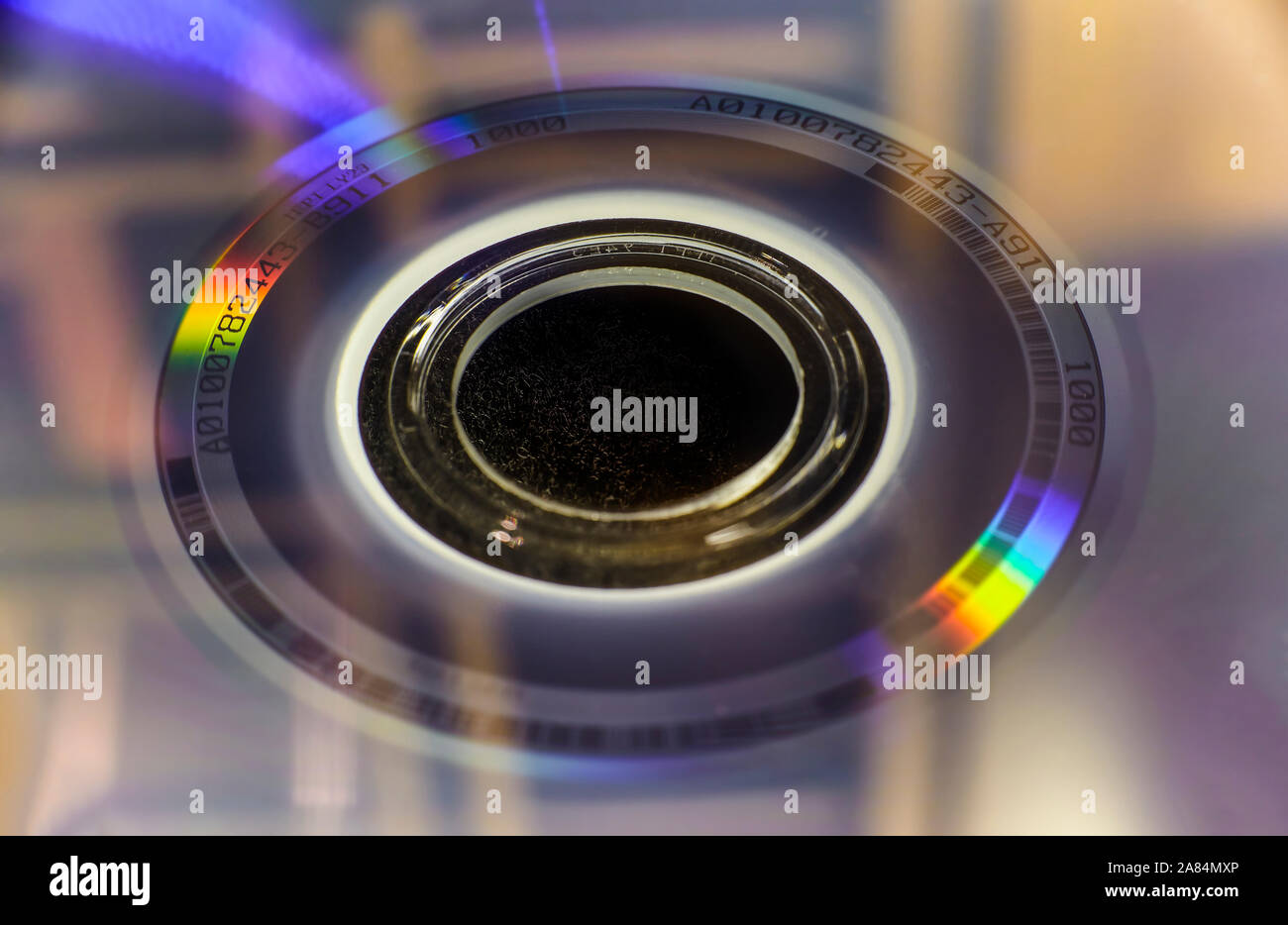 Detail of the central hole of a compact disc Stock Photo - Alamy