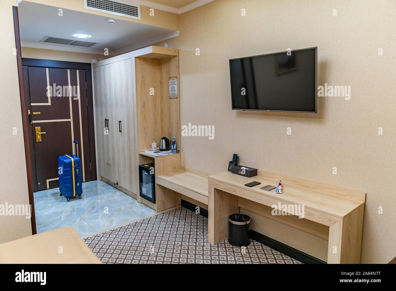 Hotel Comfortable Clean Living Room with Beige Colored Wooden Cubicles ...