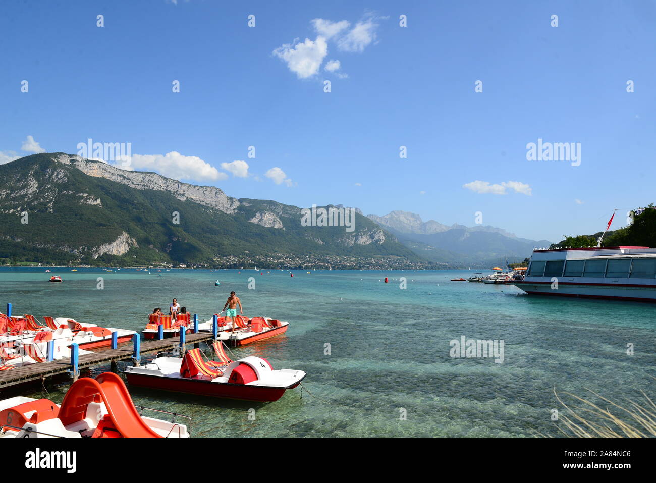 Annecy lake and town in summertime Stock Photo - Alamy