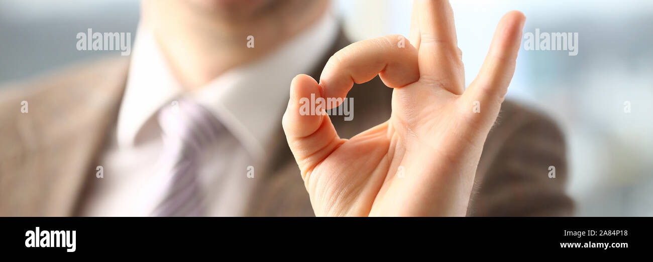 Male arm show OK or confirm during Stock Photo - Alamy
