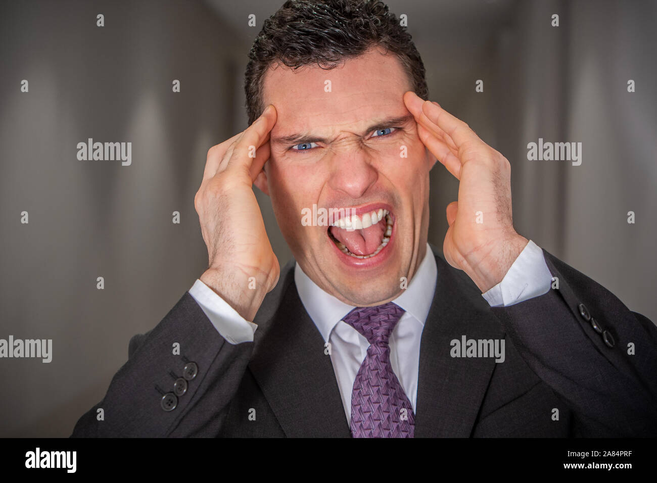 Stressed, shouting, screaming, depressed angry businessman holding his ...