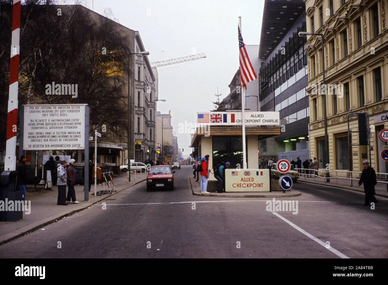 Fall of the Berlin Wall. In the picture people cross the border between ...