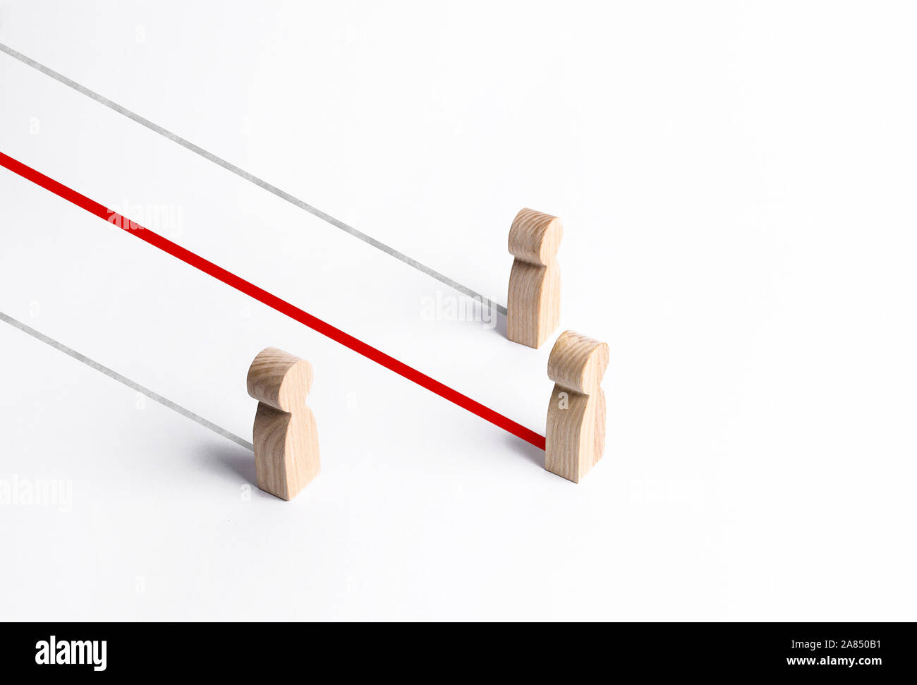 Figures of people compete, the leader is pulled forward. Advantage in ...