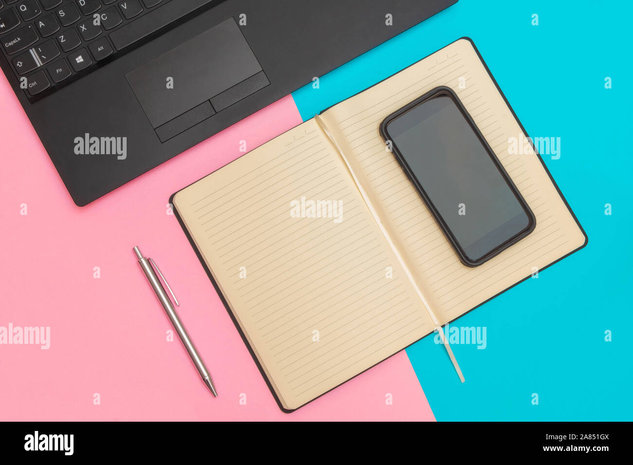 Flat lay of workspace with laptop, notebook, smartphone and pen Stock ...
