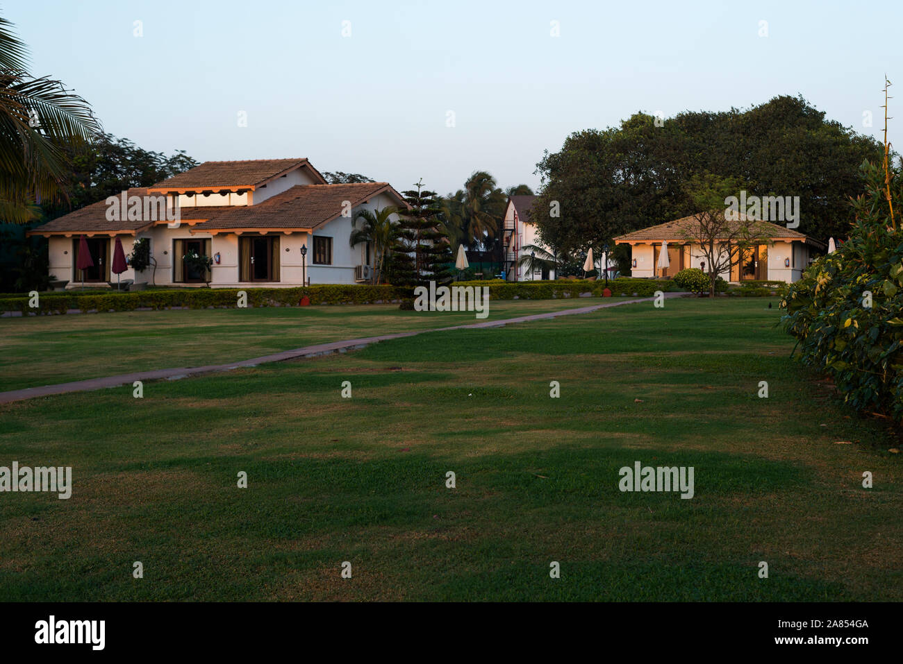 View of the front garden sitting and cottages from bar restaurant at ...