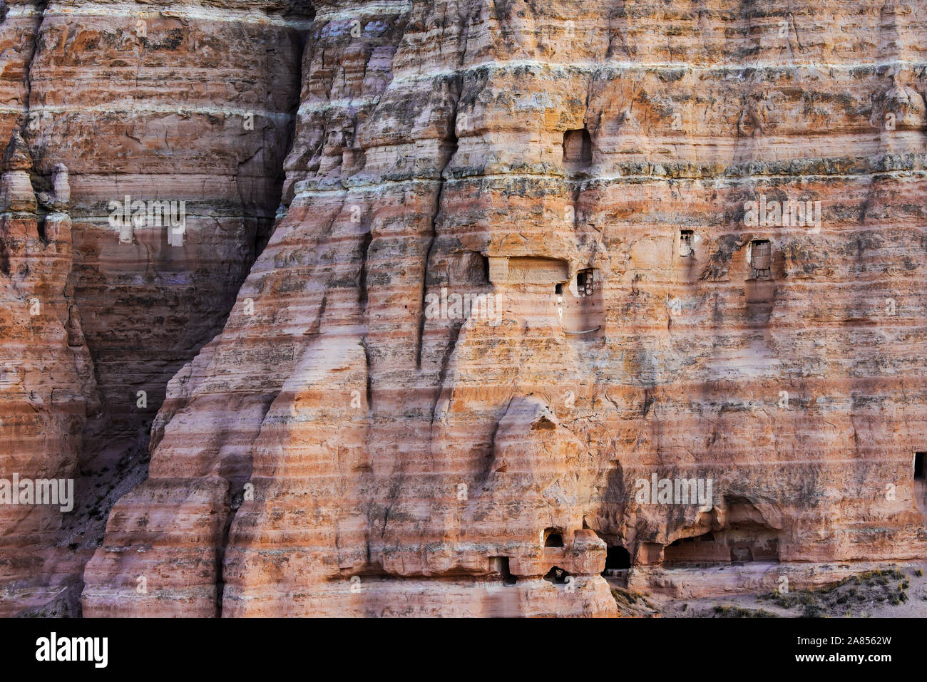 An impressive The Red Valley Cliff with cavities made by locals, Red ...