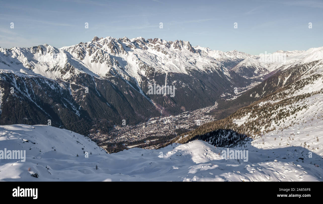 Aerial drone view of Chamonix city at the foot of snowy mountain ...