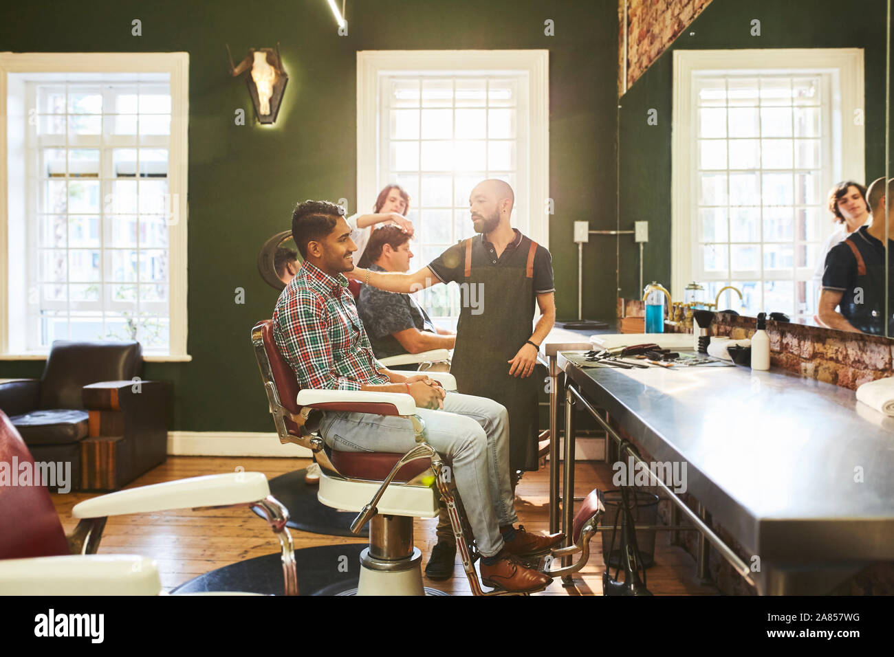 Sitting in barbers chair hi-res stock photography and images - Alamy