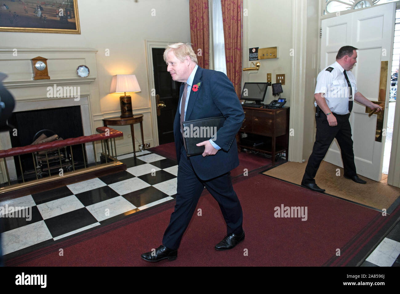 Prime Minister Boris Johnson goes back into 10 Downing Street, having ...