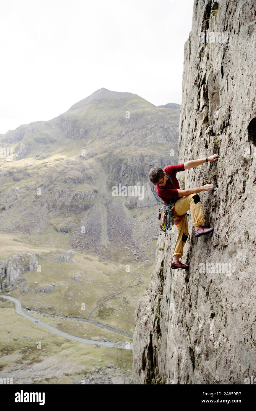 Large hanging over person hi-res stock photography and images - Alamy