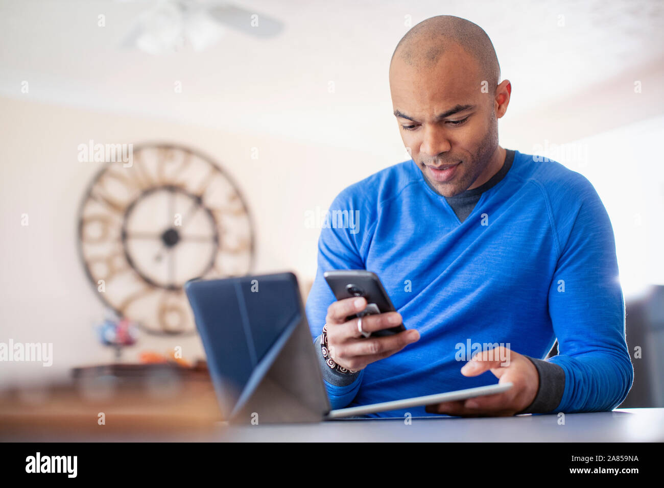 Man using digital tablets and smart phone Stock Photo - Alamy