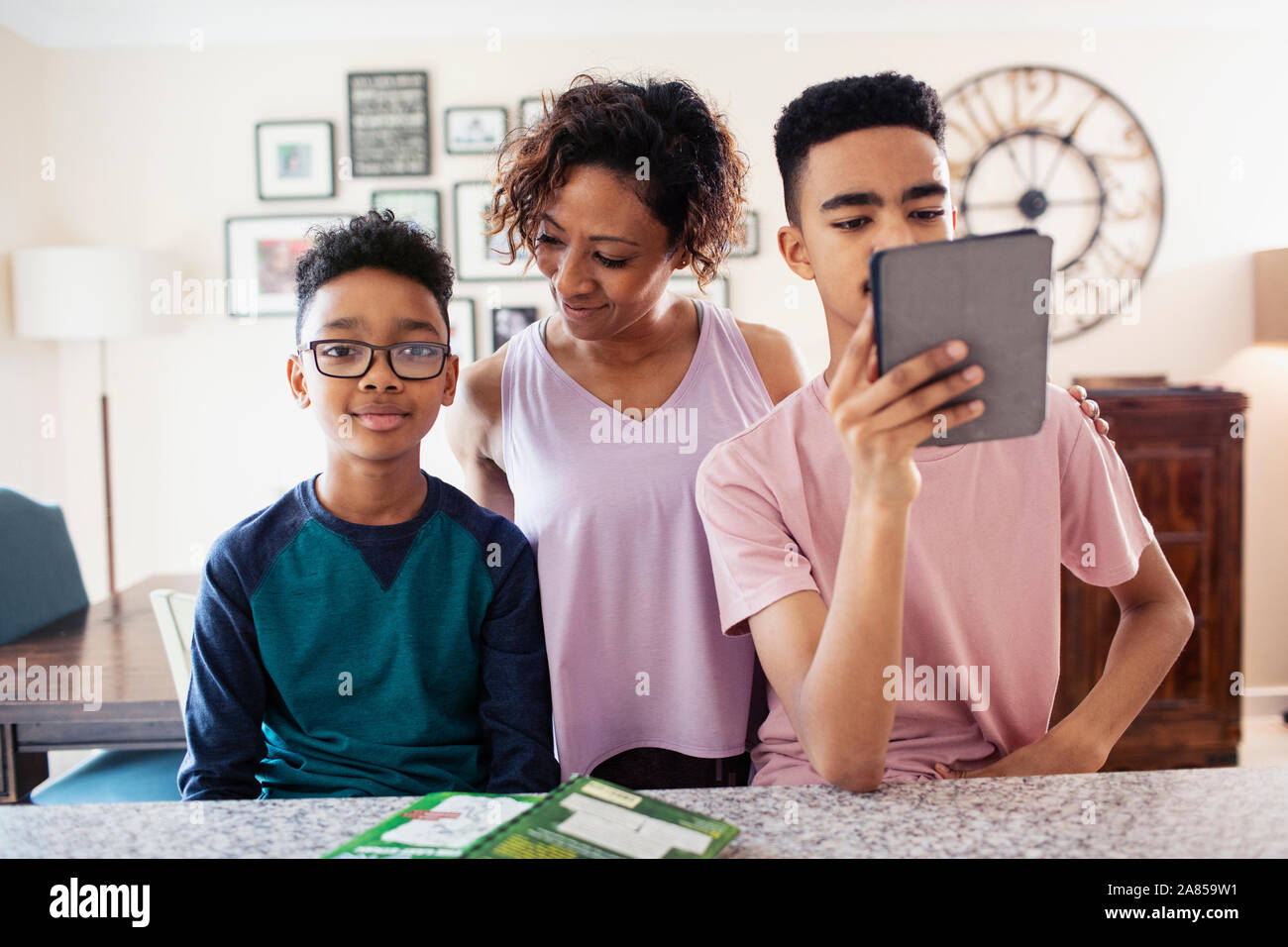 Mother sons home hi-res stock photography and images - Alamy
