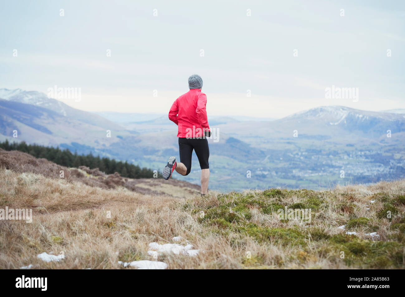 Man running on mountain hi-res stock photography and images - Alamy