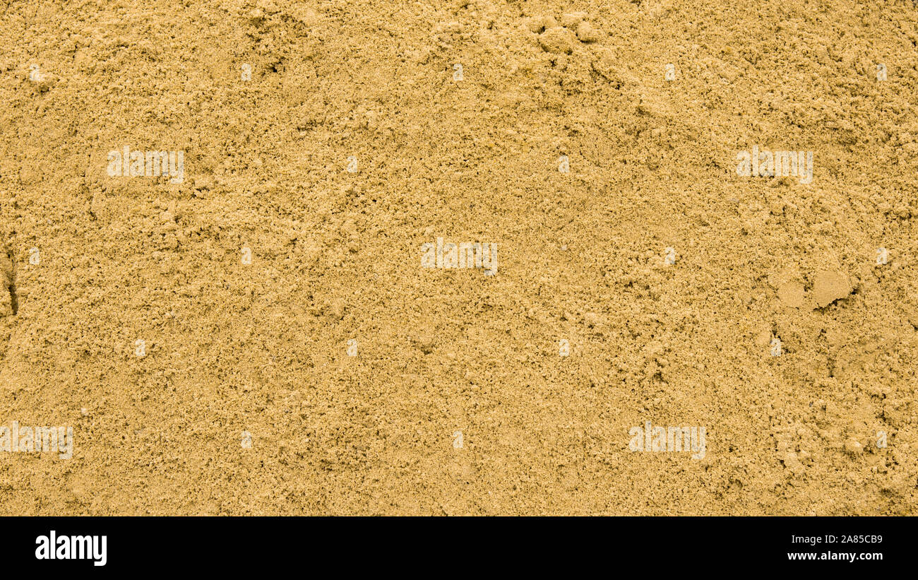 Yellow sand, backdrop texture. Textured sand surface, top view, fine ...