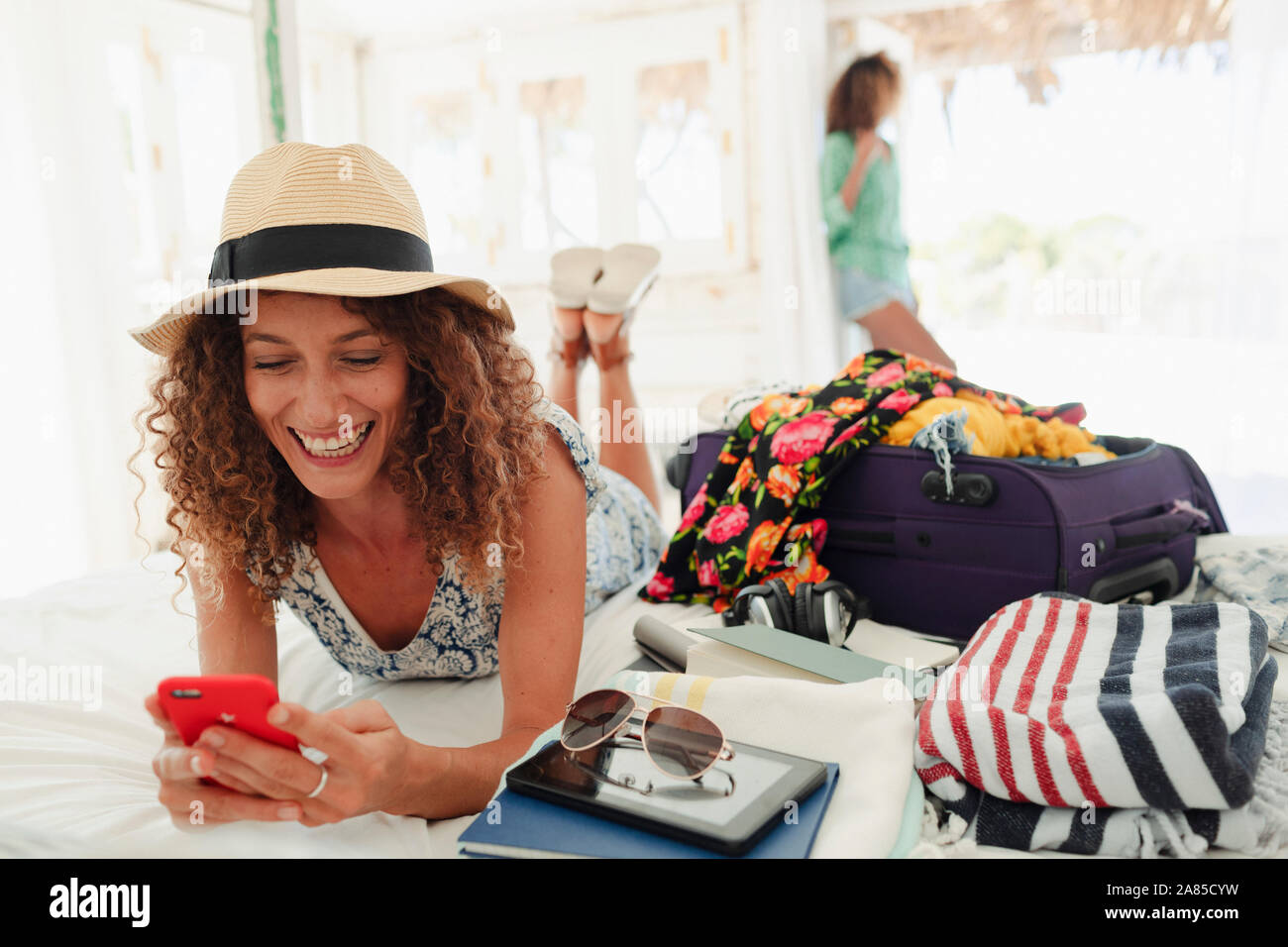 Unpacking suitcase hi-res stock photography and images - Alamy