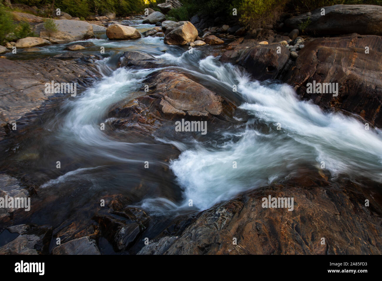 Water rushes around a rock, Middle Fork Kaweah River Stock Photo - Alamy