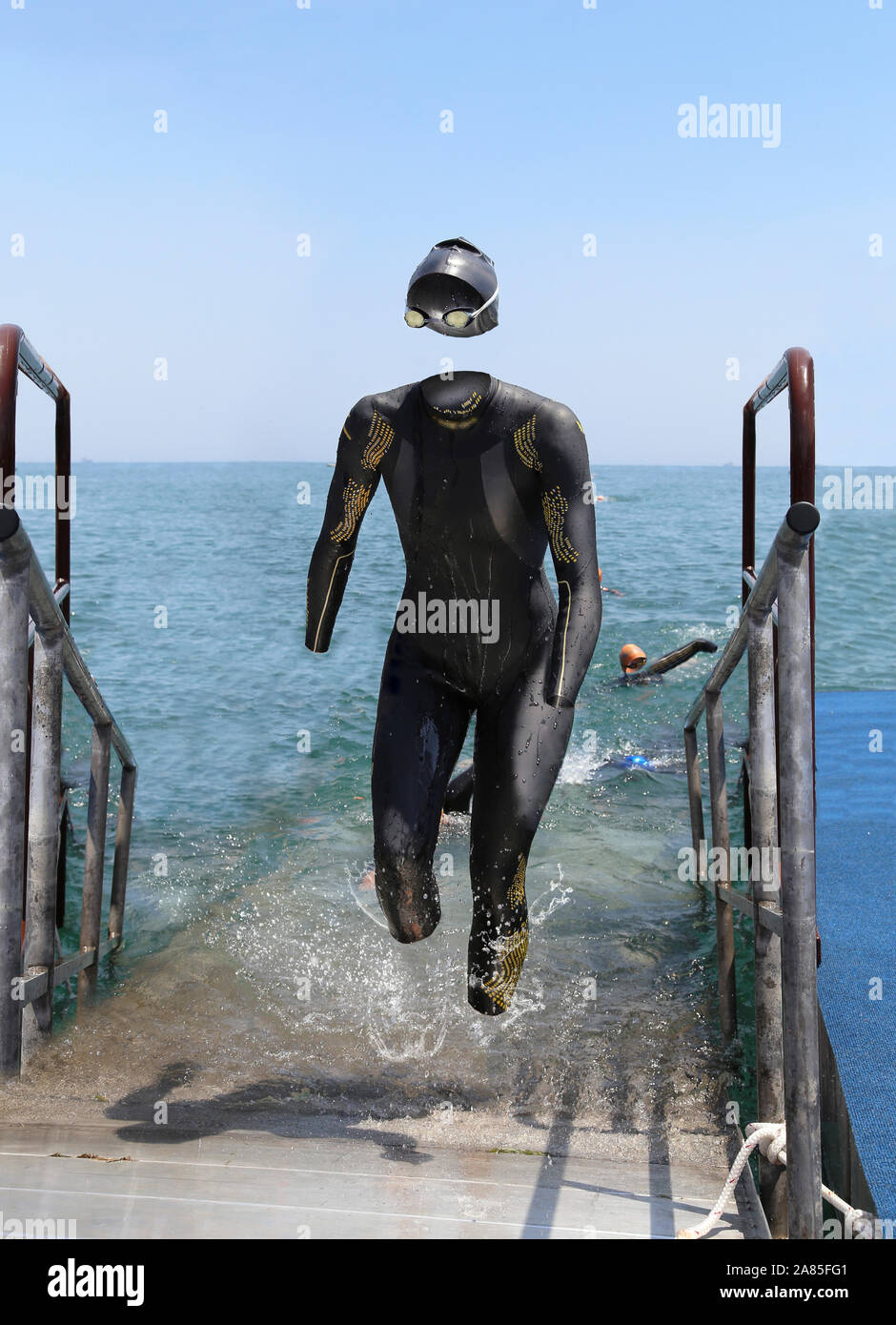Swimmer wet suit hi-res stock photography and images - Alamy