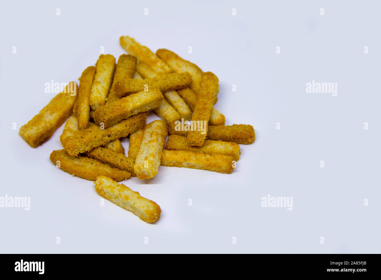 long crackers for beer on a white background Stock Photo - Alamy