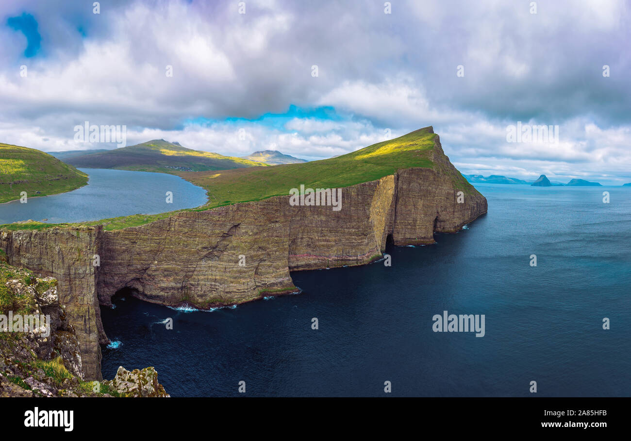 Huge cliff and lake Sorvagsvatn on island of Vagar, Faroe Islands ...
