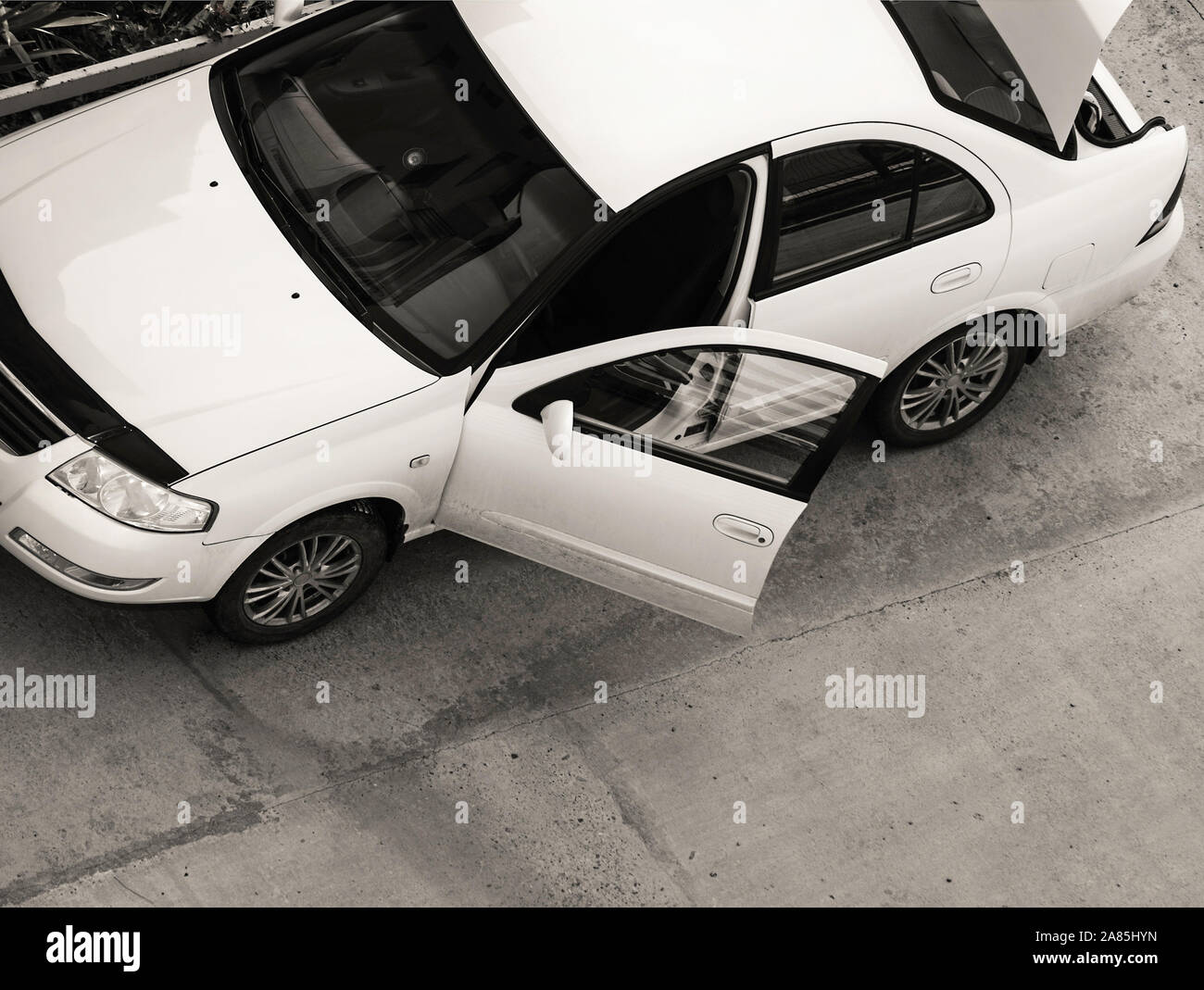 white sedan with open doors Stock Photo - Alamy