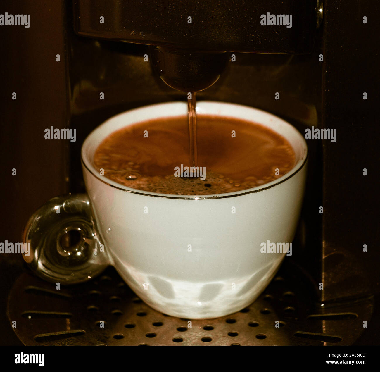 Cappuccino pouring from coffee machine hi-res stock photography and ...