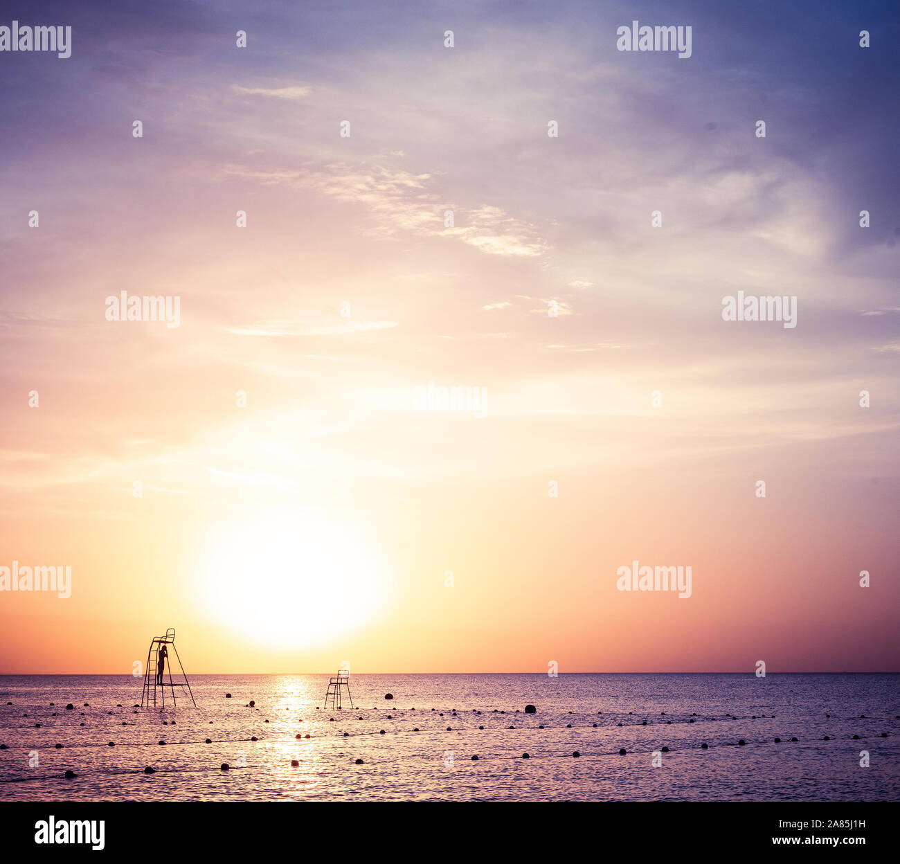 people in the sunset beach Stock Photo - Alamy