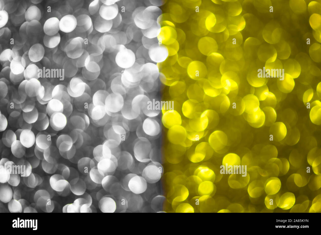 Abstract glitter two color lights background. de-focused. silver, gold ...