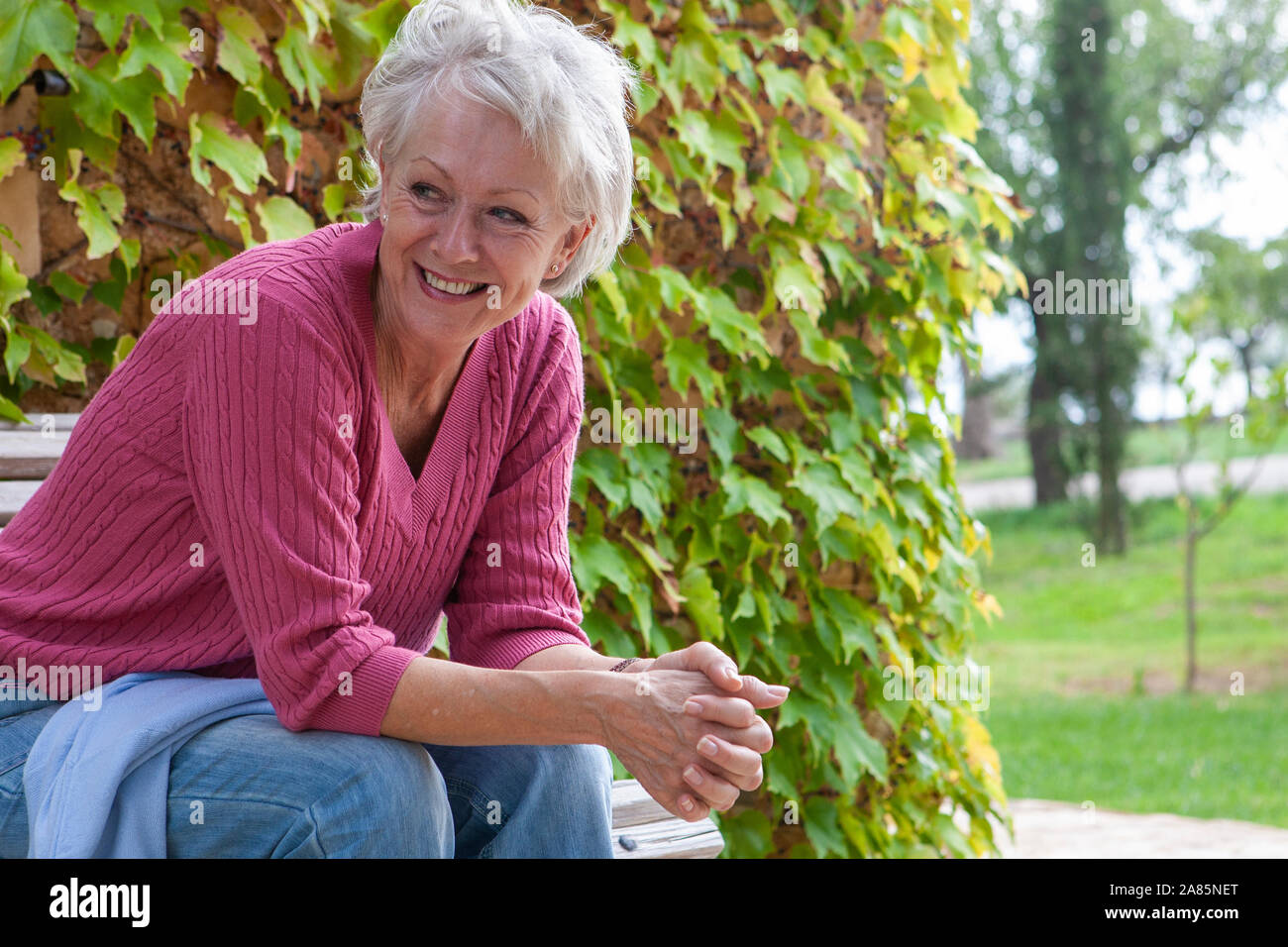 Elder woman garden hi-res stock photography and images - Alamy